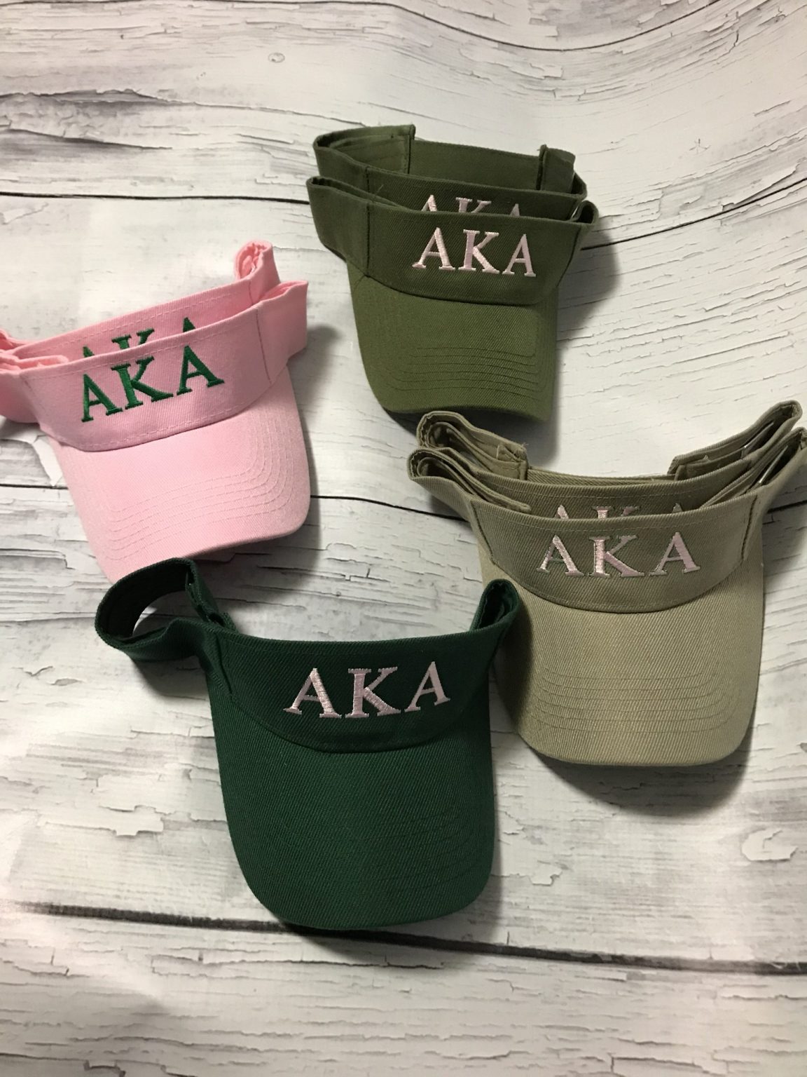 Ladie’s Assorted AKA Hats – Xpress Yourself Sportswear